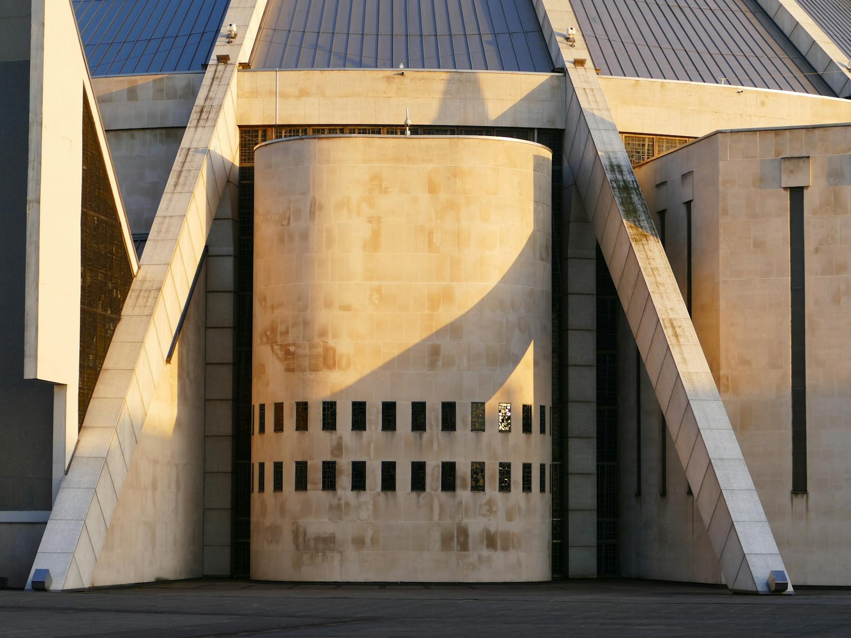 Close-up of modern architectural detail in Liverpool bathed in golden light